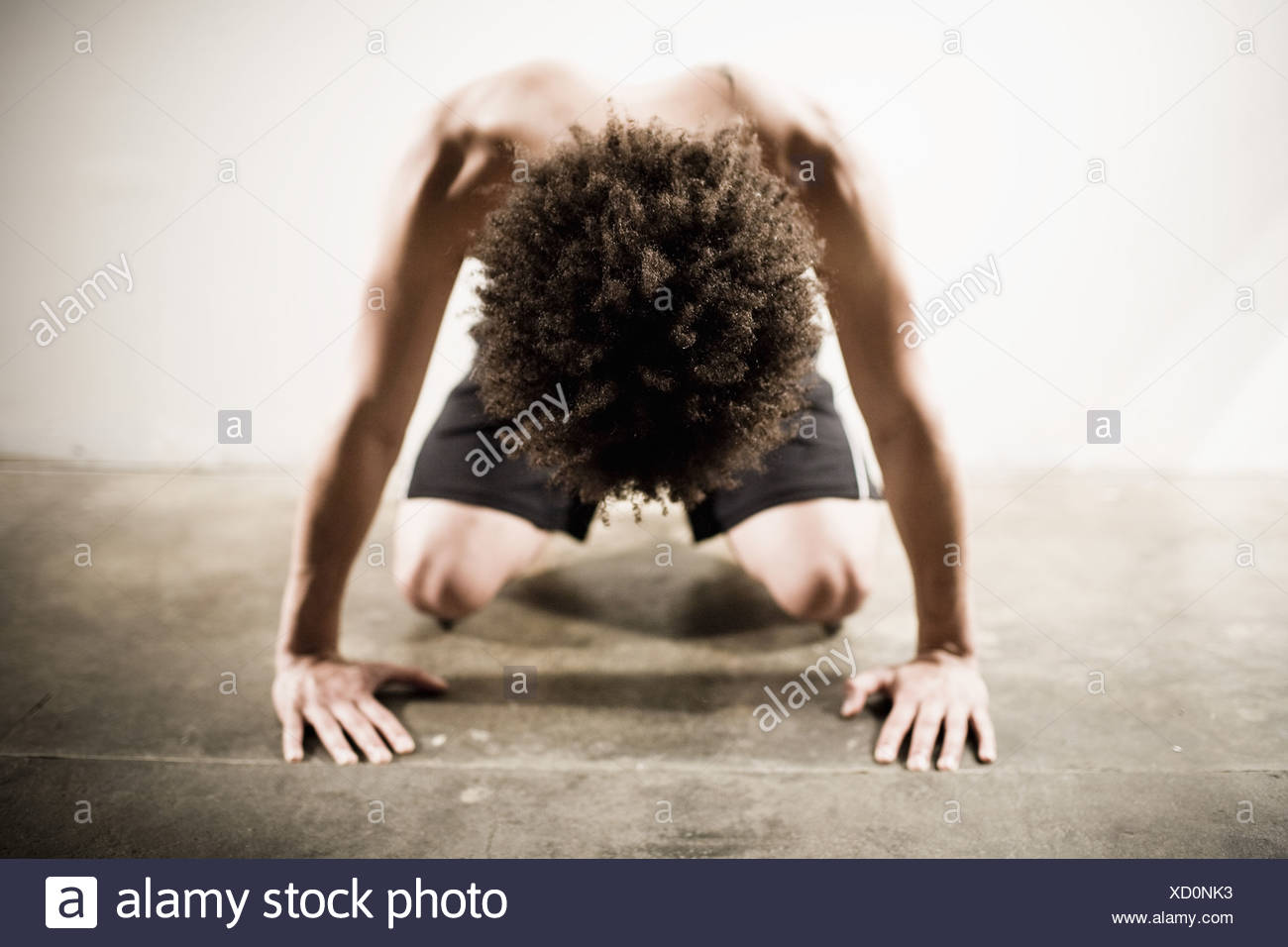 Man Kneeling Head Down Stock Photos & Man Kneeling Head Down Stock ...