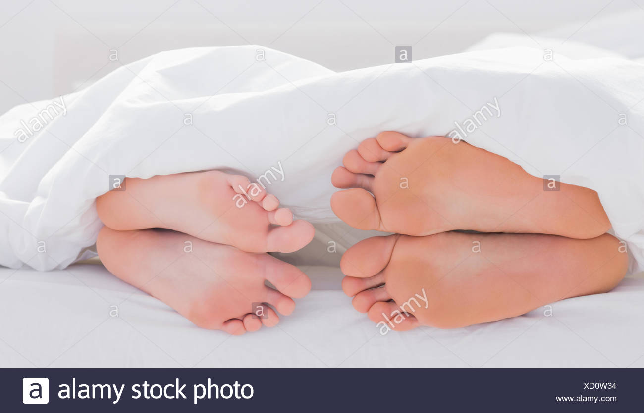 Under Bed Couple Feet High Resolution Stock Photography and Images - Alamy