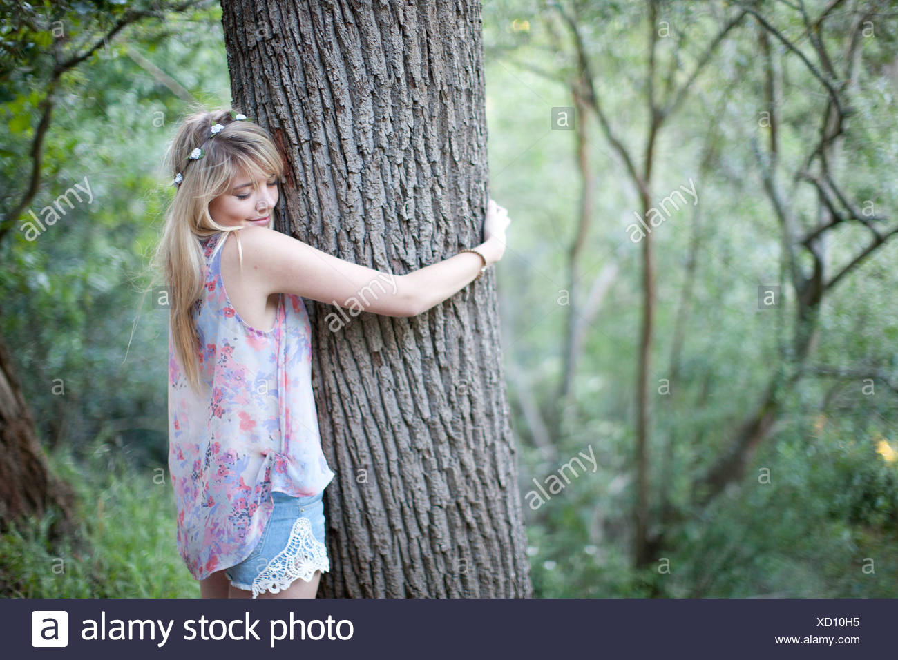 Child Hugging Tree High Resolution Stock Photography and Images - Alamy