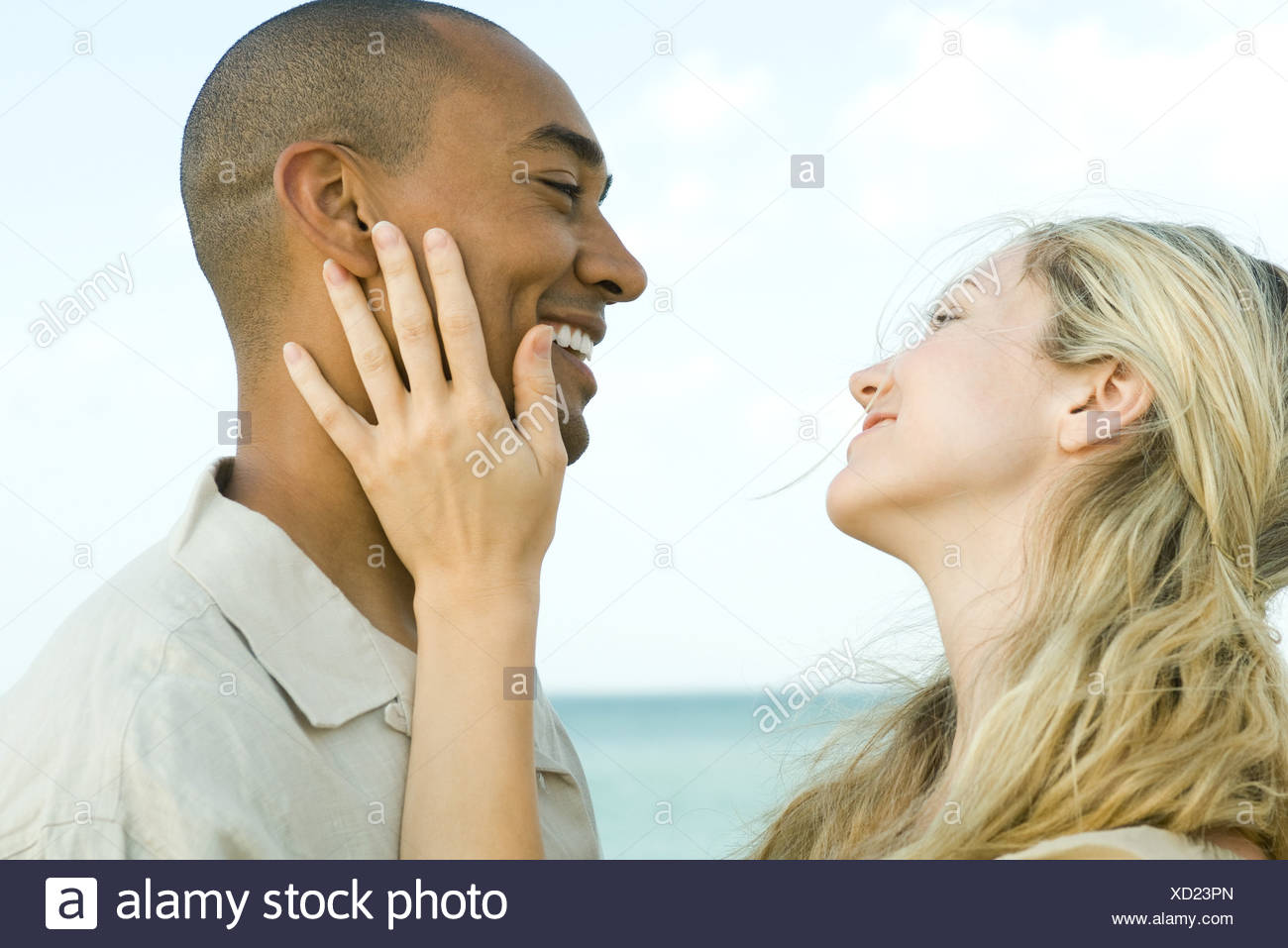Hand At Cheek High Resolution Stock Photography and Images - Alamy