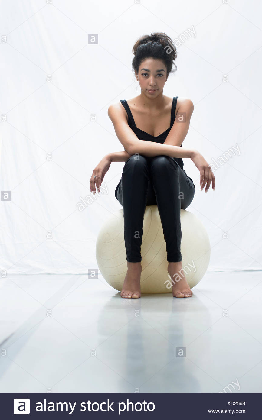 Sitting On Exercise Ball High Resolution Stock Photography and Images ...