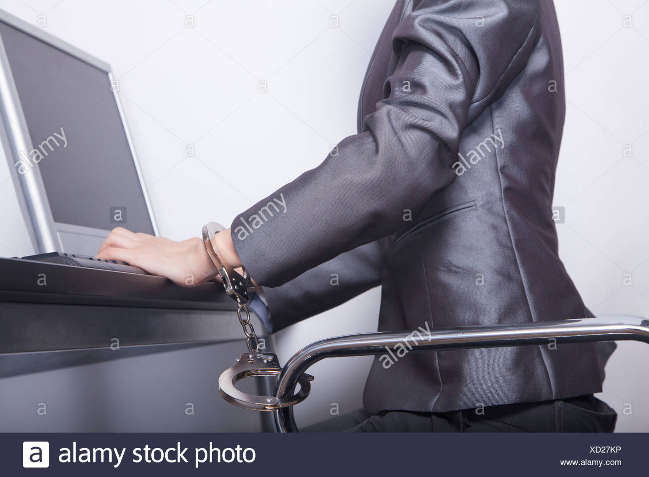 Young Businesswoman Handcuffed Office Chair High Resolution Stock ...