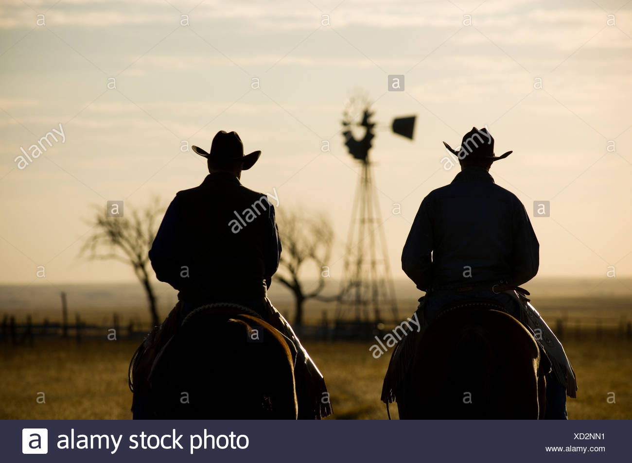 Cowboys On Fence Stock Photos & Cowboys On Fence Stock Images - Alamy
