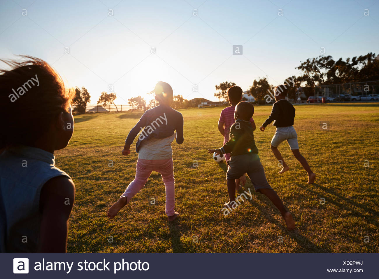 Schoolchildren Playing Football Stock Photos & Schoolchildren Playing ...