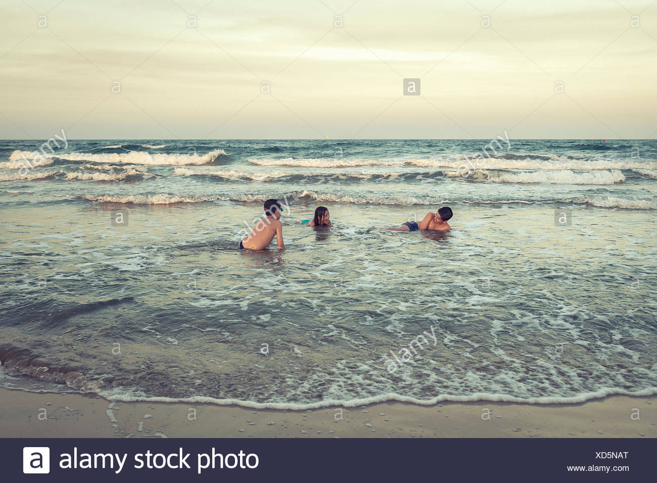 Sister And Brother Playing On Beach High Resolution Stock Photography ...
