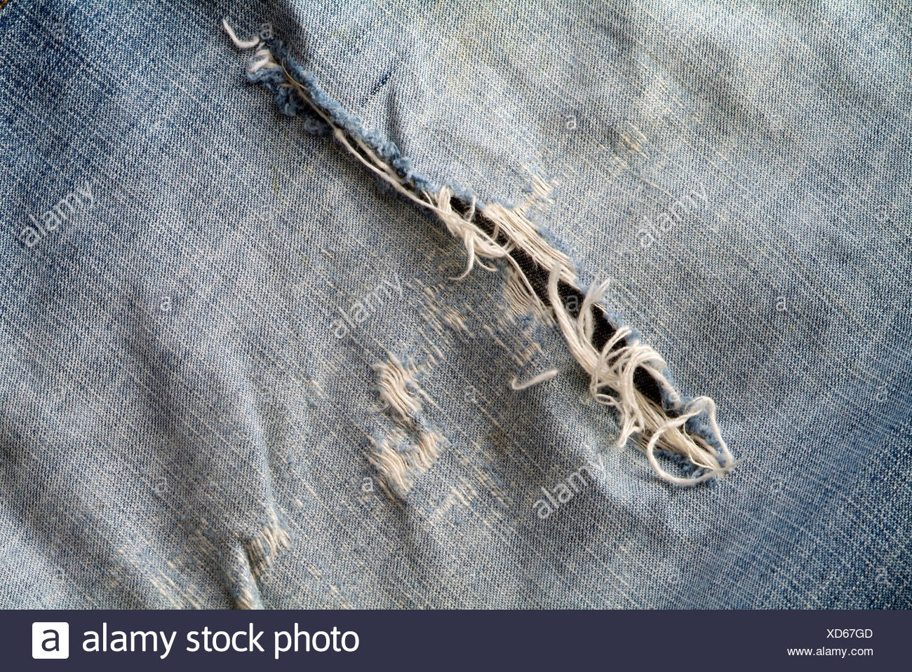 Worn Out Jeans High Resolution Stock Photography and Images - Alamy