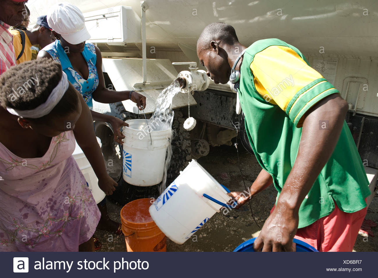 Fetching Water Buckets Stock Photos & Fetching Water Buckets Stock ...