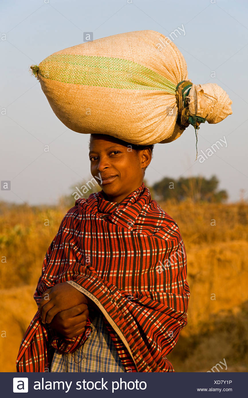 Woman Carrying A Sack High Resolution Stock Photography and Images - Alamy