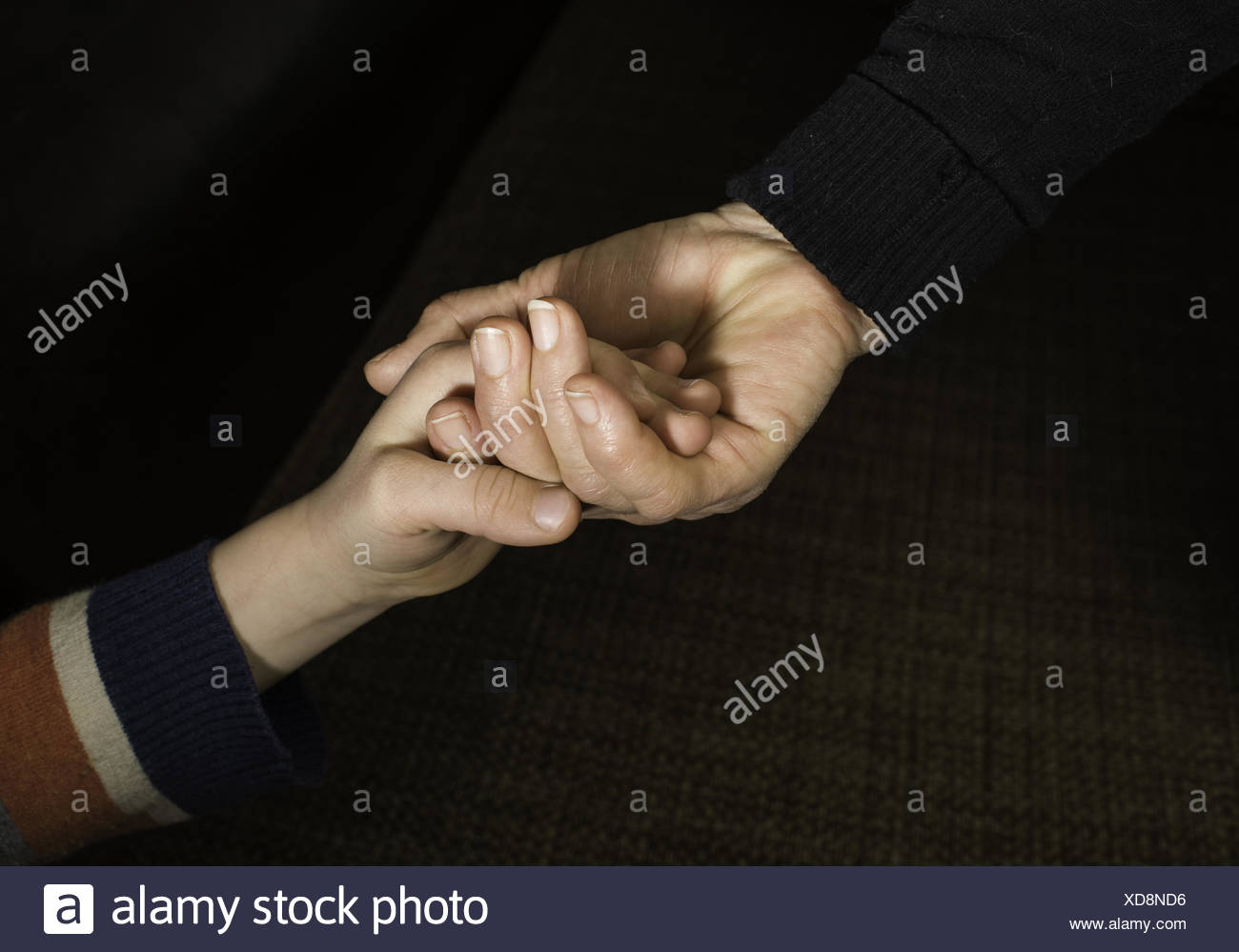 Two Parents Holding Childs Hand High Resolution Stock Photography and ...