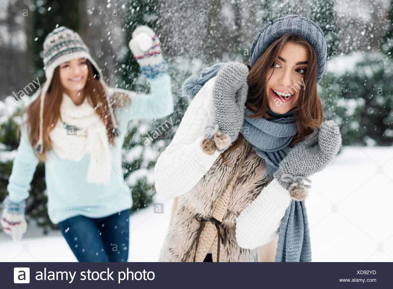 Woman Snowball Fight High Resolution Stock Photography and Images - Alamy