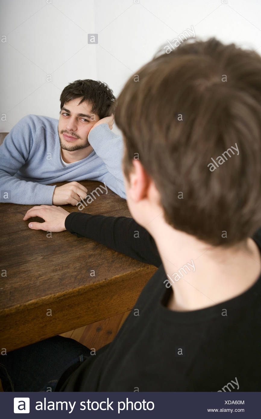Reaching Across Table High Resolution Stock Photography and Images - Alamy