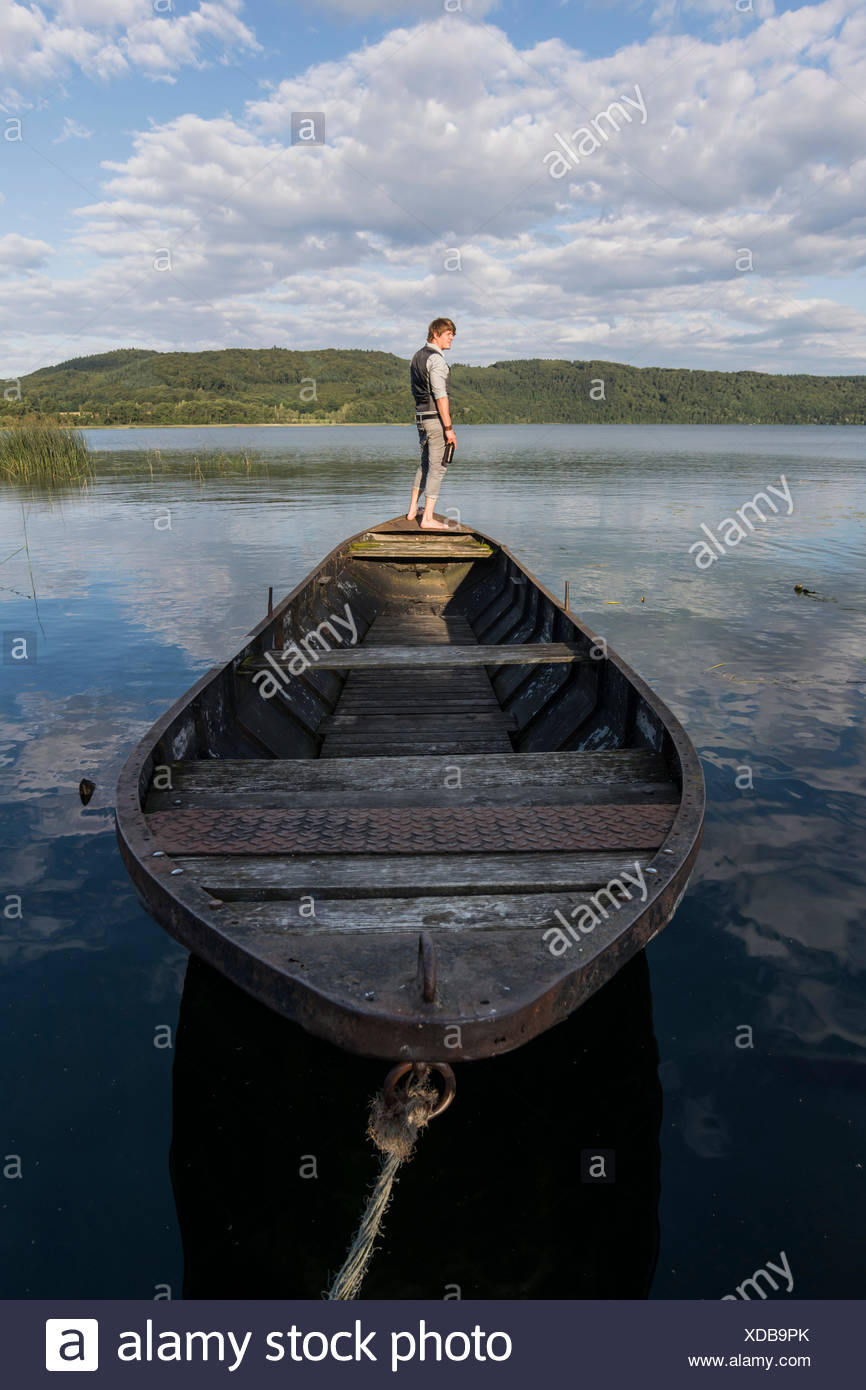 Man Standing On The Boat High Resolution Stock Photography and Images ...