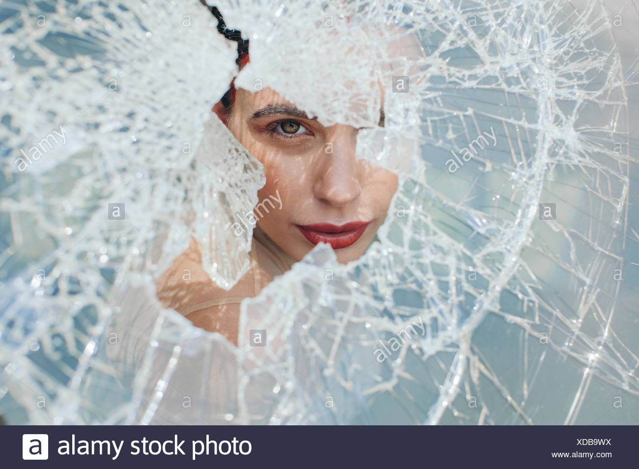 Woman Broken Window High Resolution Stock Photography and Images - Alamy