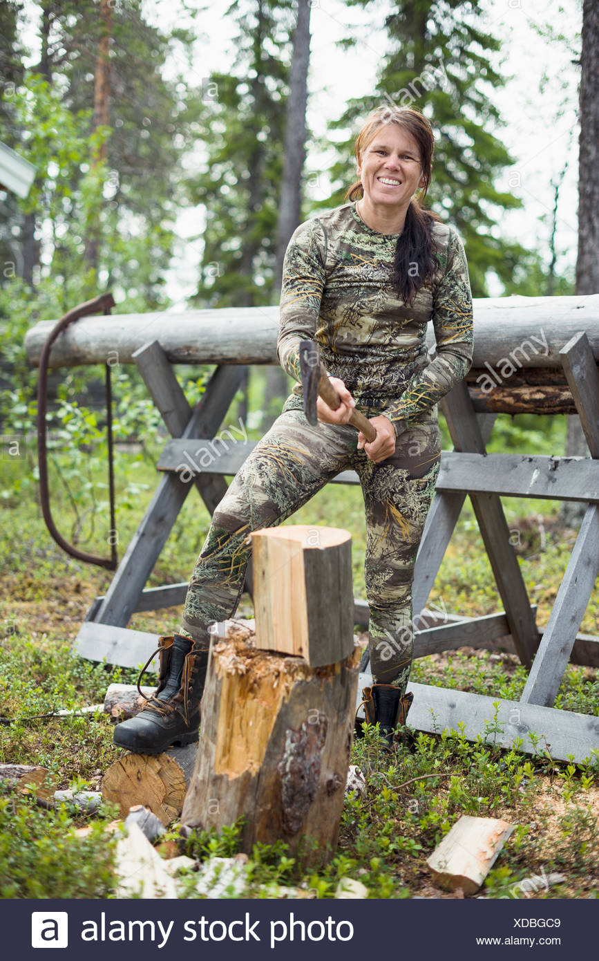 Woman Chopping Wood Axe High Resolution Stock Photography and Images ...