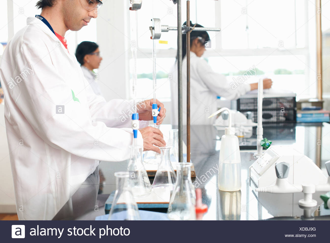 Chemistry Student Doing Experiment High Resolution Stock Photography ...