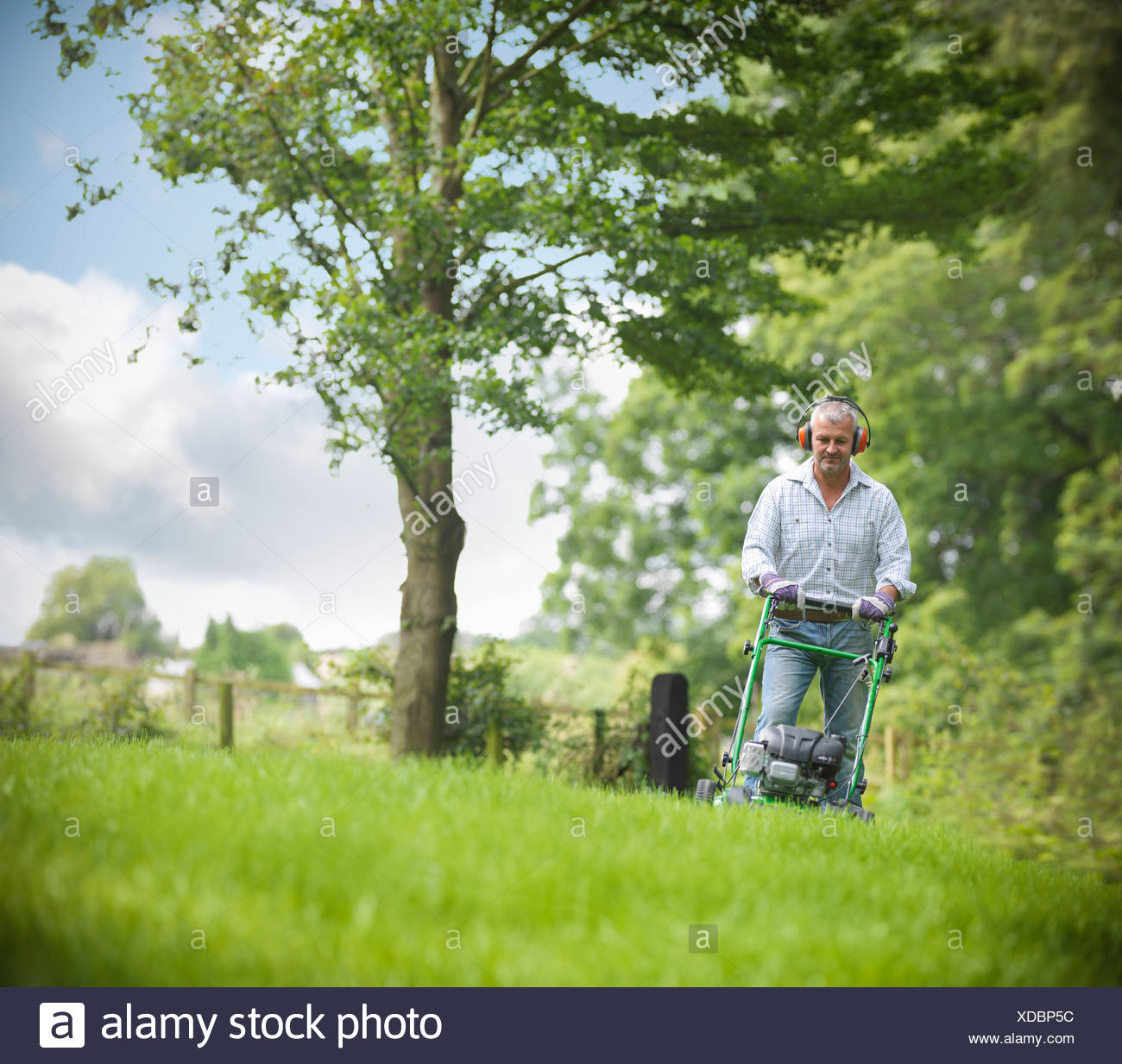 Man Grass Cutting High Resolution Stock Photography and Images - Alamy