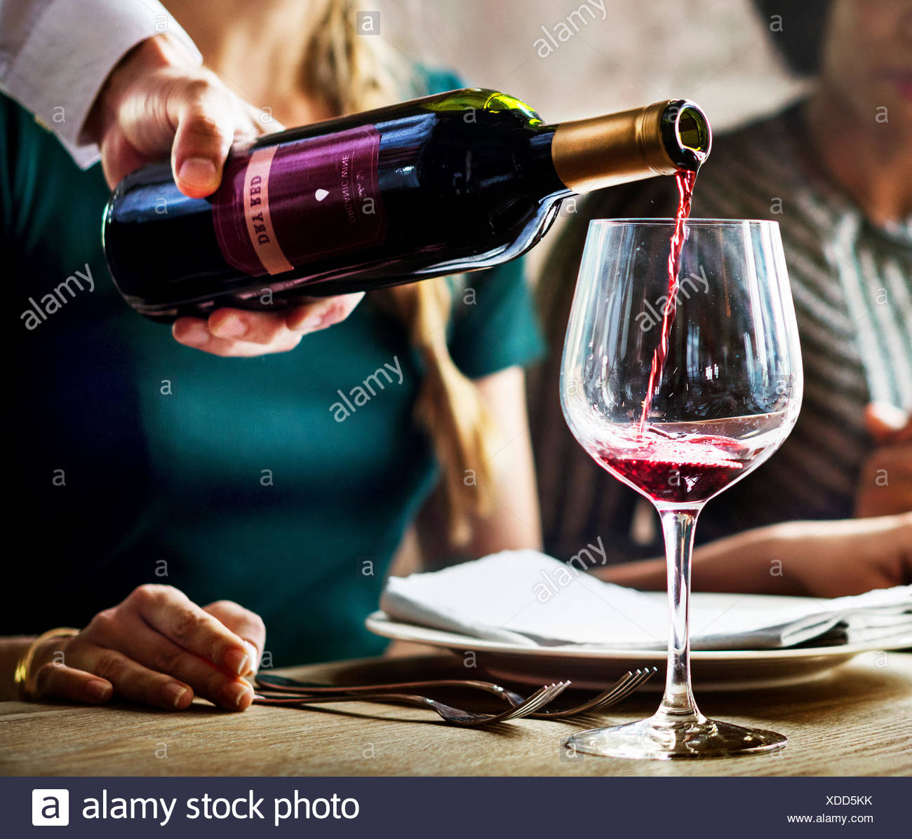 Woman Serving Wine High Resolution Stock Photography and Images - Alamy