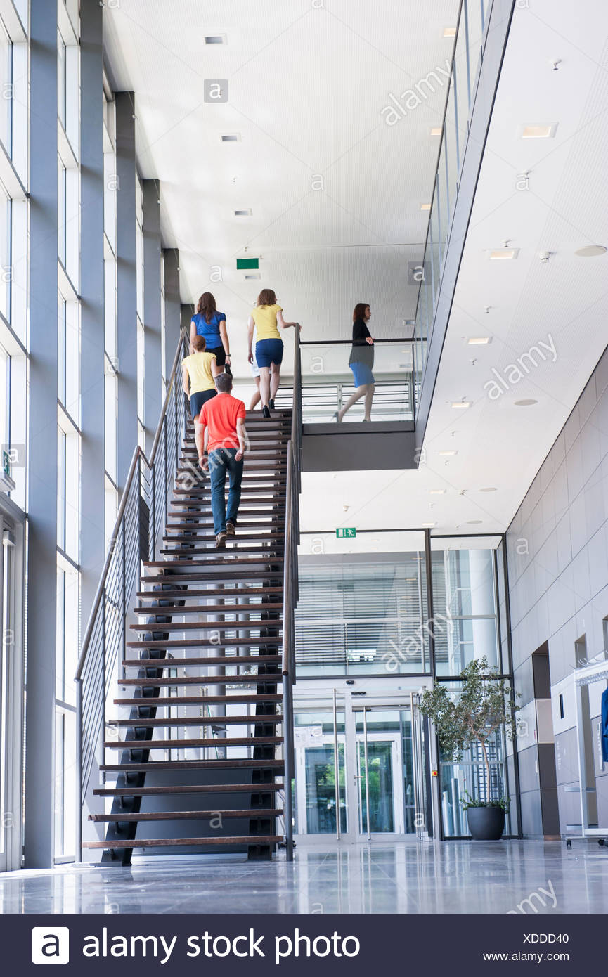 Lady Climbing Stairs High Resolution Stock Photography and Images - Alamy