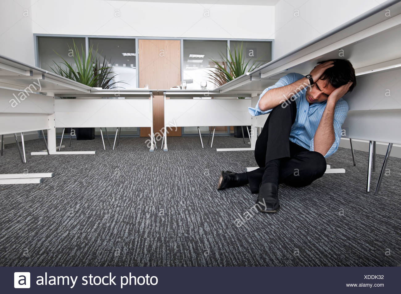Person Hiding In Office High Resolution Stock Photography and Images ...