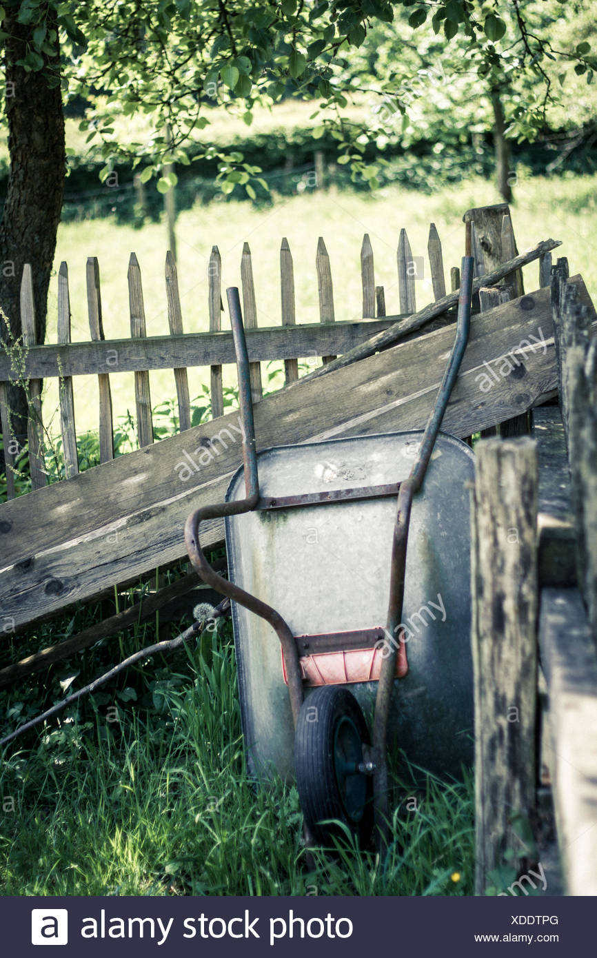 Old Metal Wheelbarrow High Resolution Stock Photography and Images - Alamy