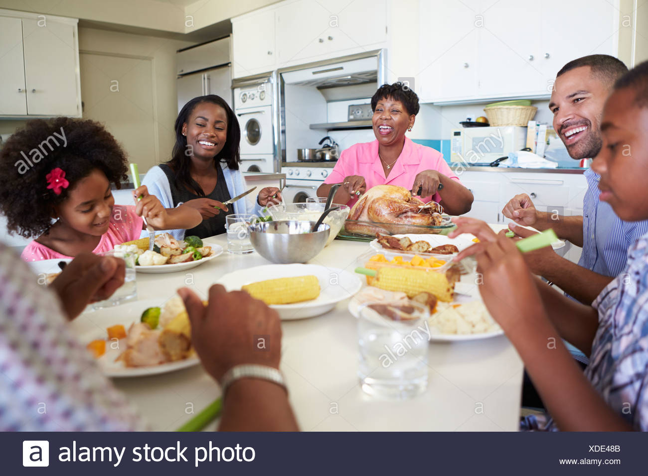 African Family Eating Around Table High Resolution Stock Photography ...