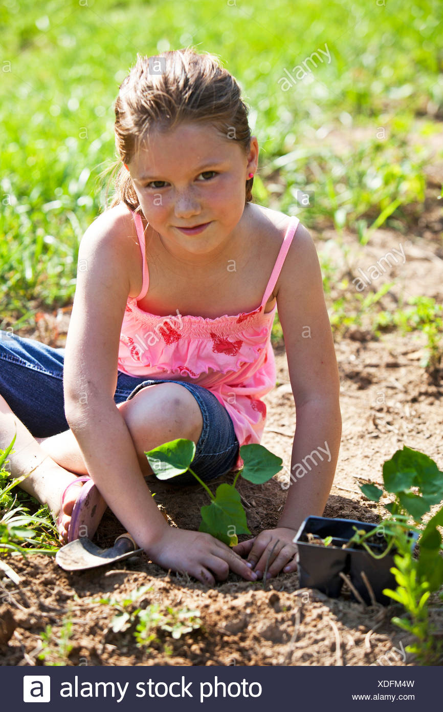 Girl Planting High Resolution Stock Photography and Images - Alamy