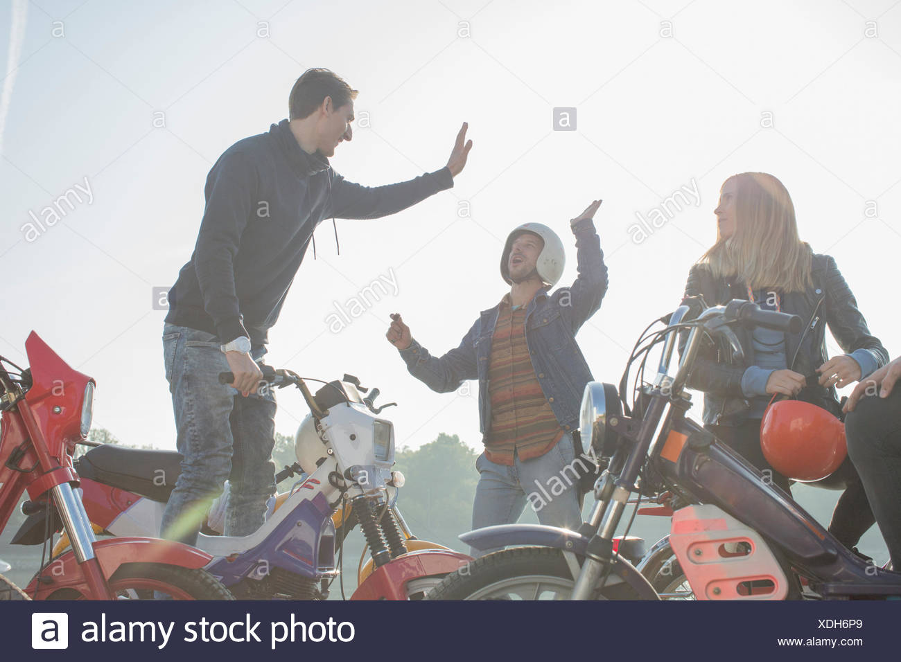 Giving Five Friends High Resolution Stock Photography and Images - Alamy