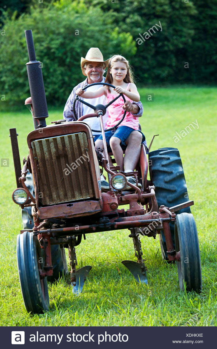 Girl Driving Tractor Stock Photos & Girl Driving Tractor Stock Images ...