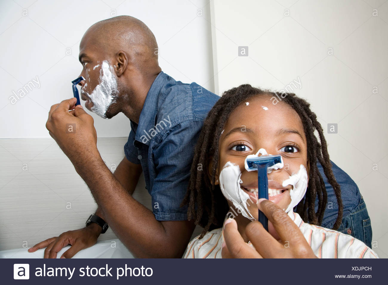 Son Imitating Father Stock Photos & Son Imitating Father Stock Images ...