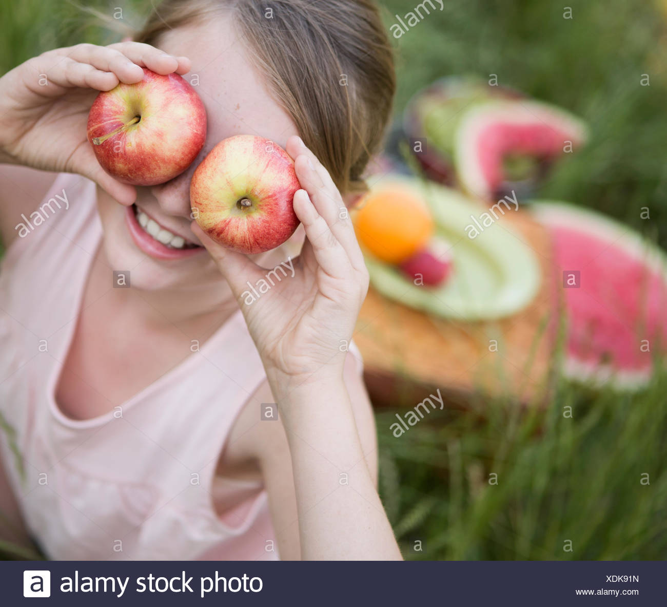 Girl Holding Apple High Resolution Stock Photography and Images - Alamy
