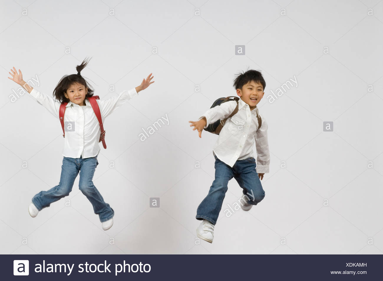 School Students Jumping Stock Photos & School Students Jumping Stock ...