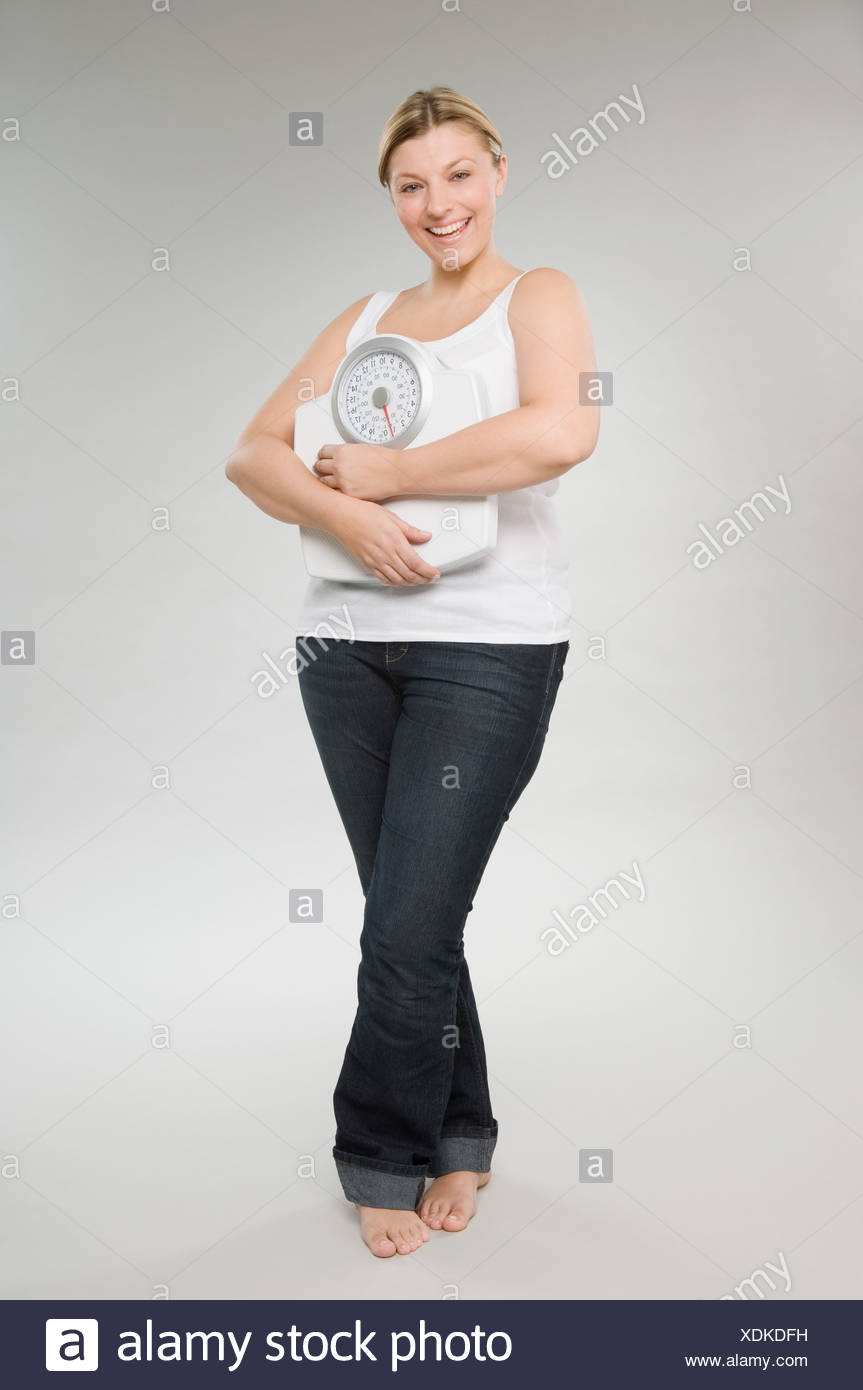 Fat Woman And Scales High Resolution Stock Photography and Images - Alamy
