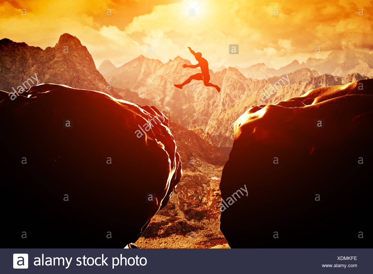 Silhouette Man Jumping Over Cliff High Resolution Stock Photography and ...