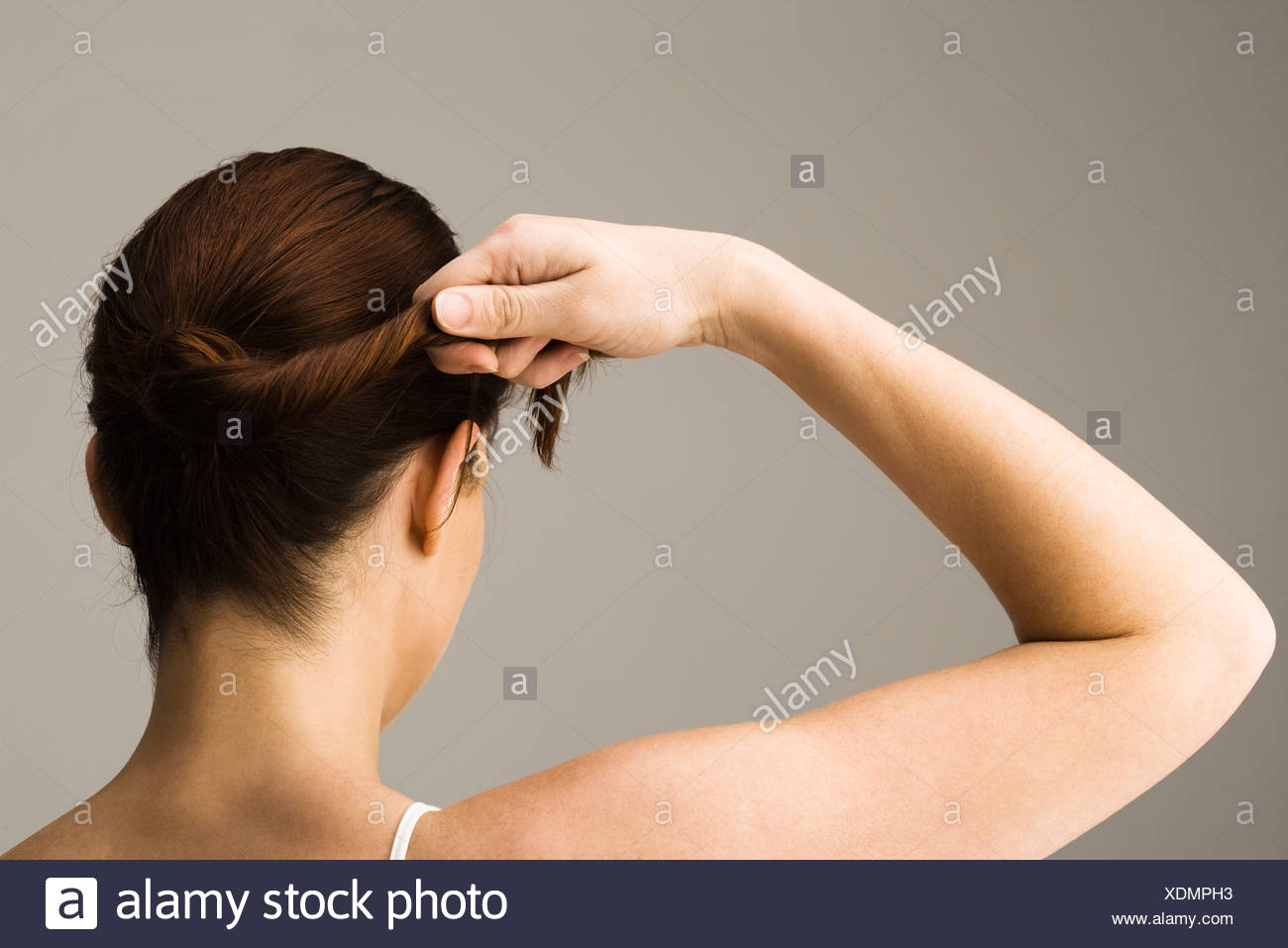 Woman Styling Hair Rear View Stock Photos & Woman Styling Hair Rear ...