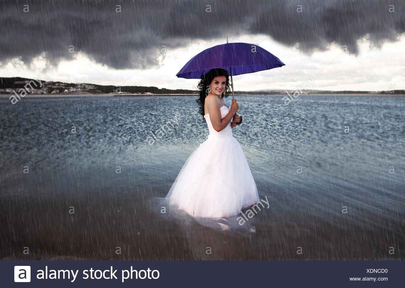 Beach Raining High Resolution Stock Photography and Images - Alamy