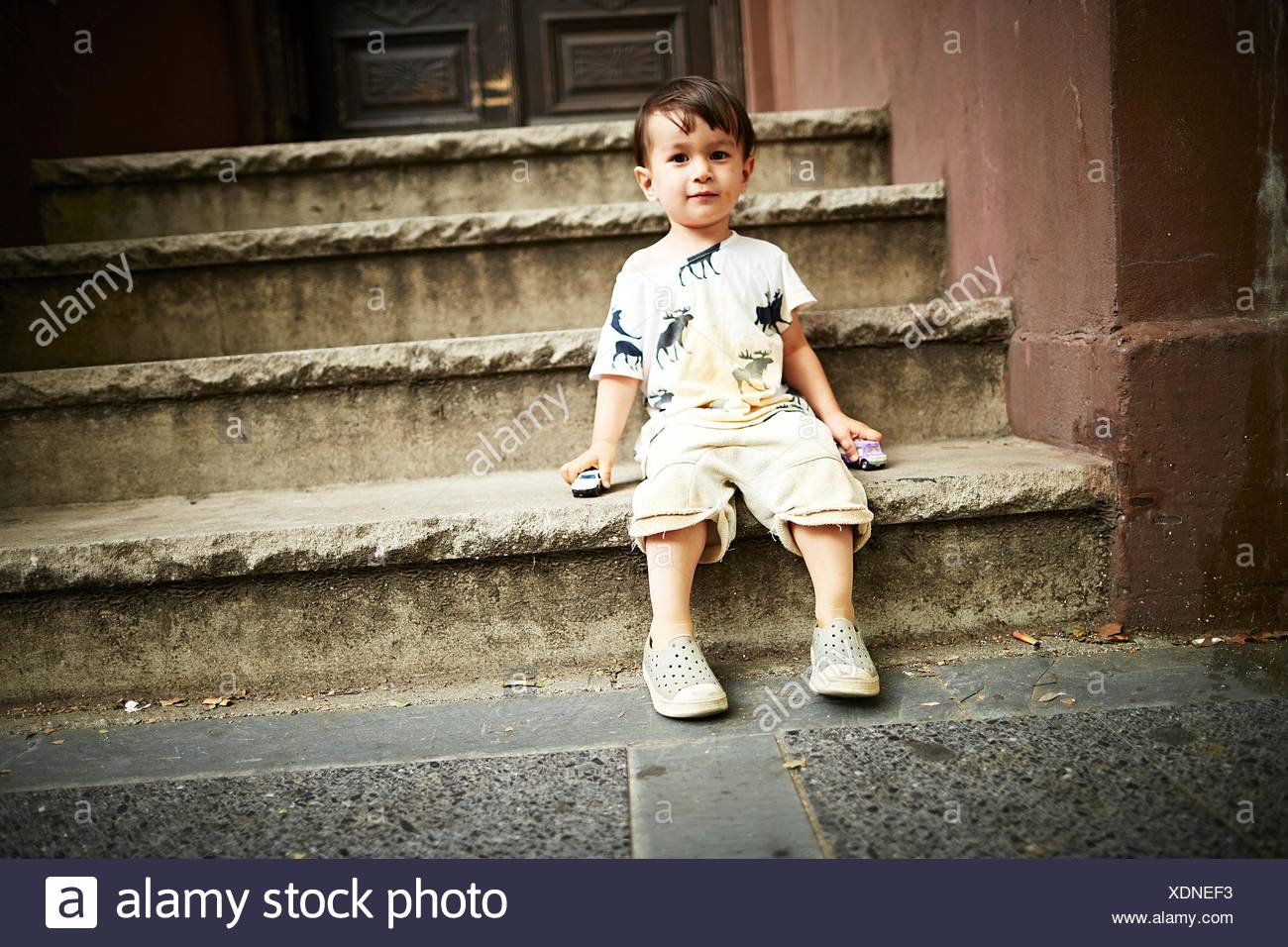 Boy On Steps High Resolution Stock Photography and Images - Alamy