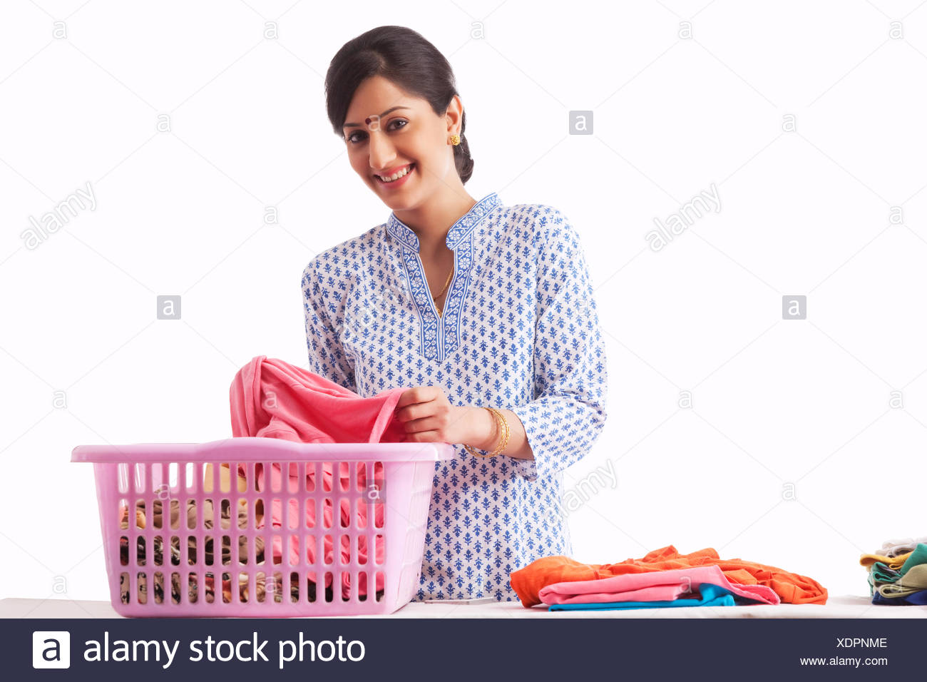 Woman Sorting Clothes High Resolution Stock Photography and Images - Alamy