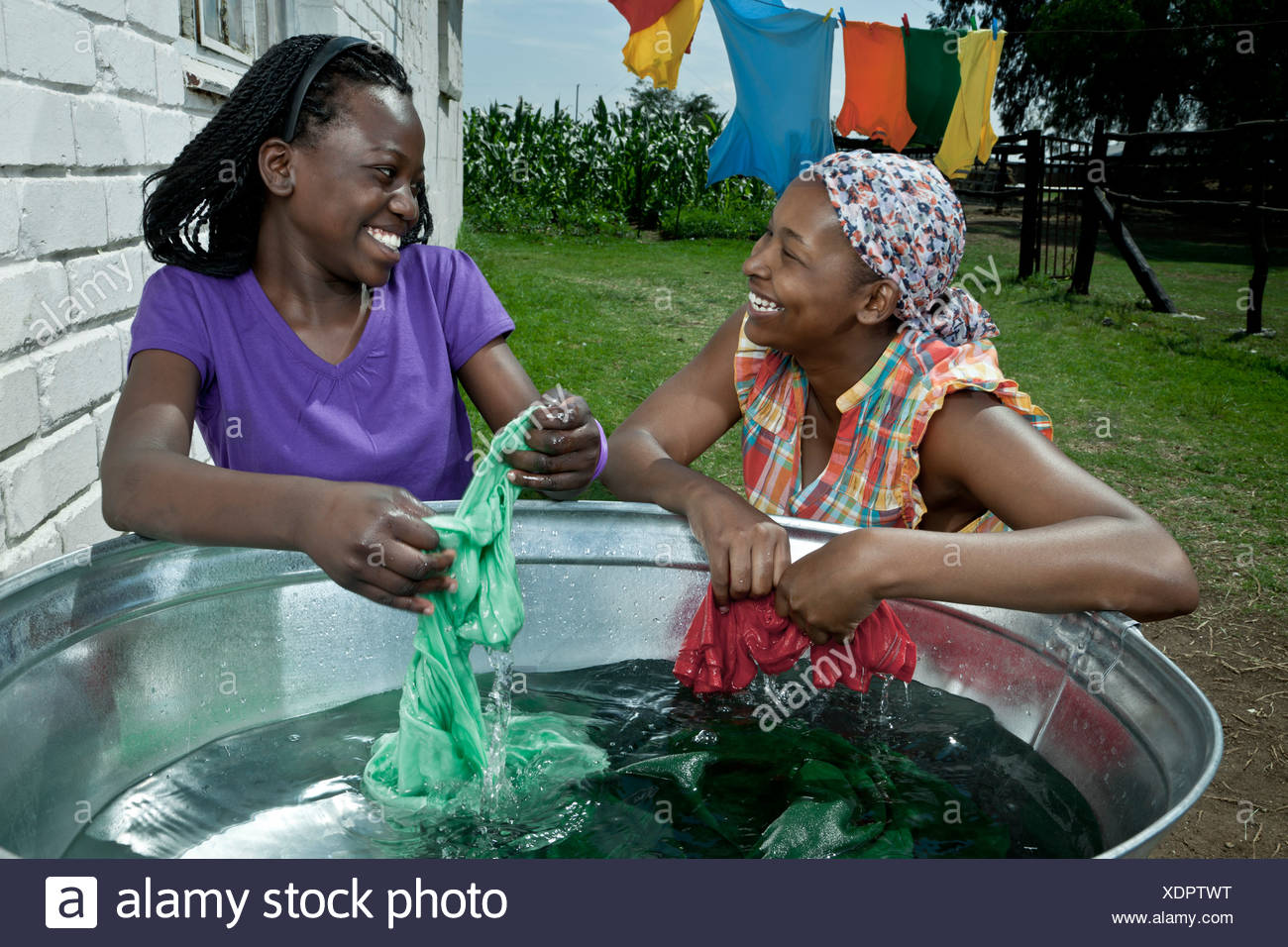 African Women Washing High Resolution Stock Photography and Images - Alamy