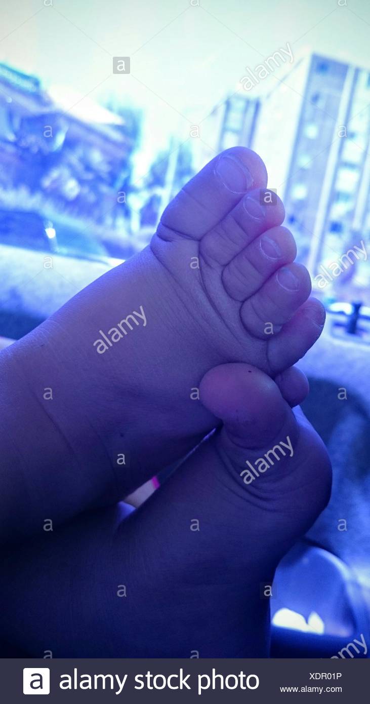 Close Up Crossed Legs Feet High Resolution Stock Photography and Images ...