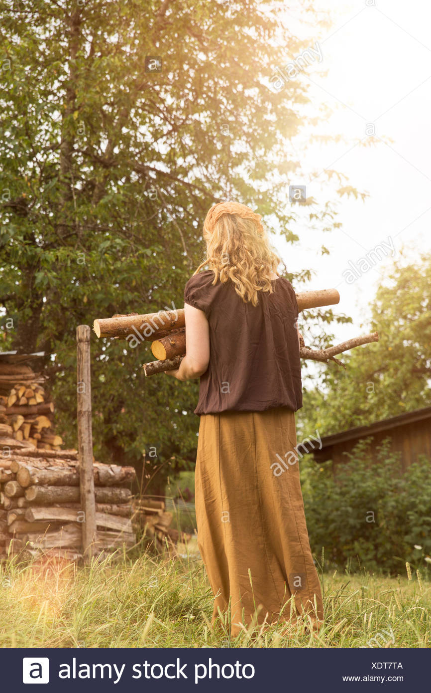 Old Woman Carrying Wood High Resolution Stock Photography and Images ...