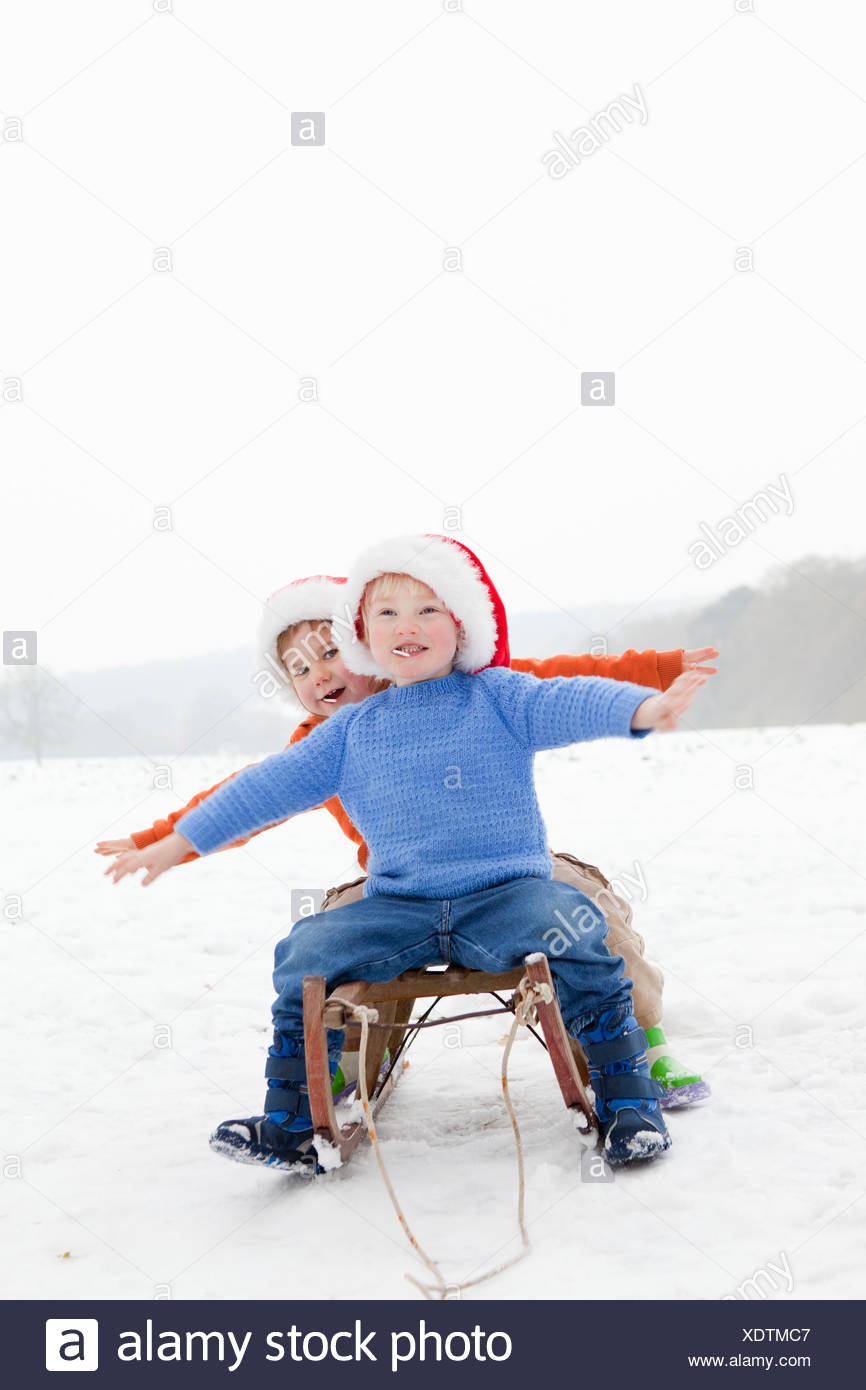 Children Boys On Sled High Resolution Stock Photography and Images - Alamy
