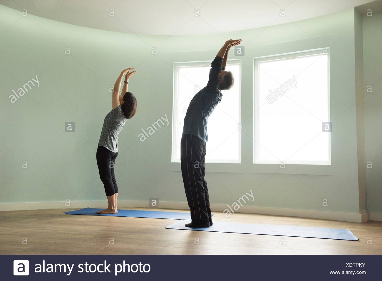 Bending Over Window Stock Photos & Bending Over Window Stock Images - Alamy