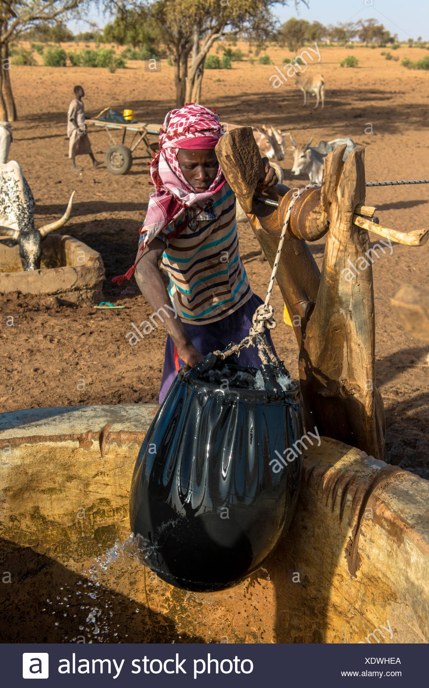 Boy Fetching Water High Resolution Stock Photography and Images - Alamy