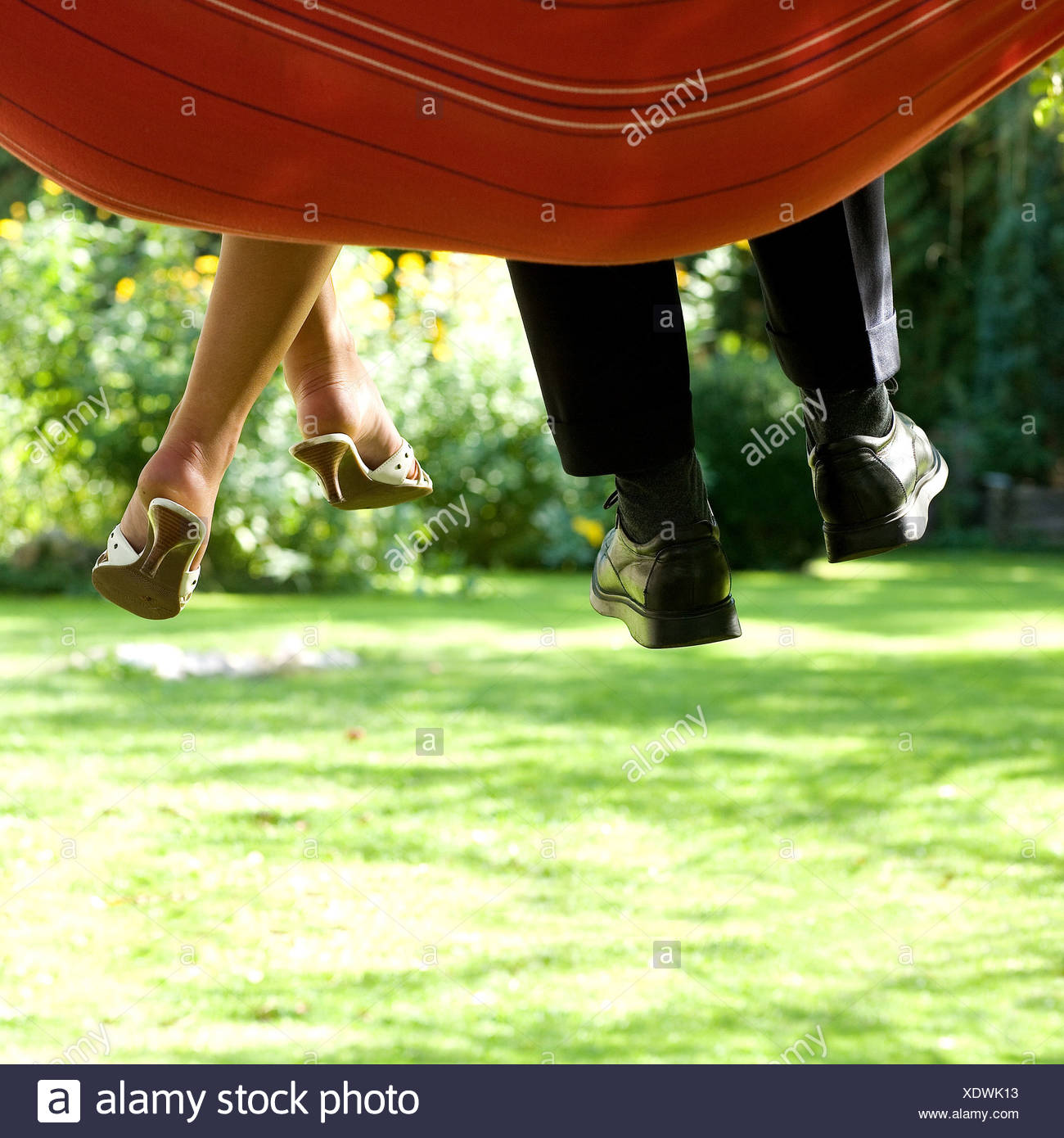 Legs Dangling High Resolution Stock Photography and Images - Alamy