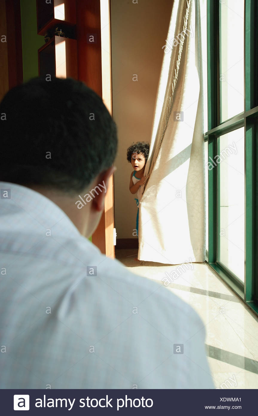 Child Hiding Behind Curtain High Resolution Stock Photography and ...