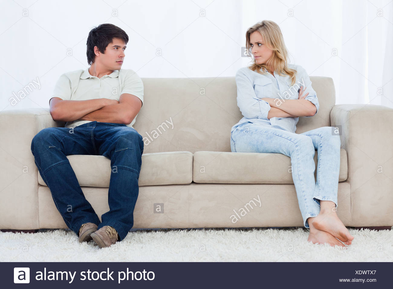Man Woman Sitting Opposite Ends Stock Photos & Man Woman Sitting ...