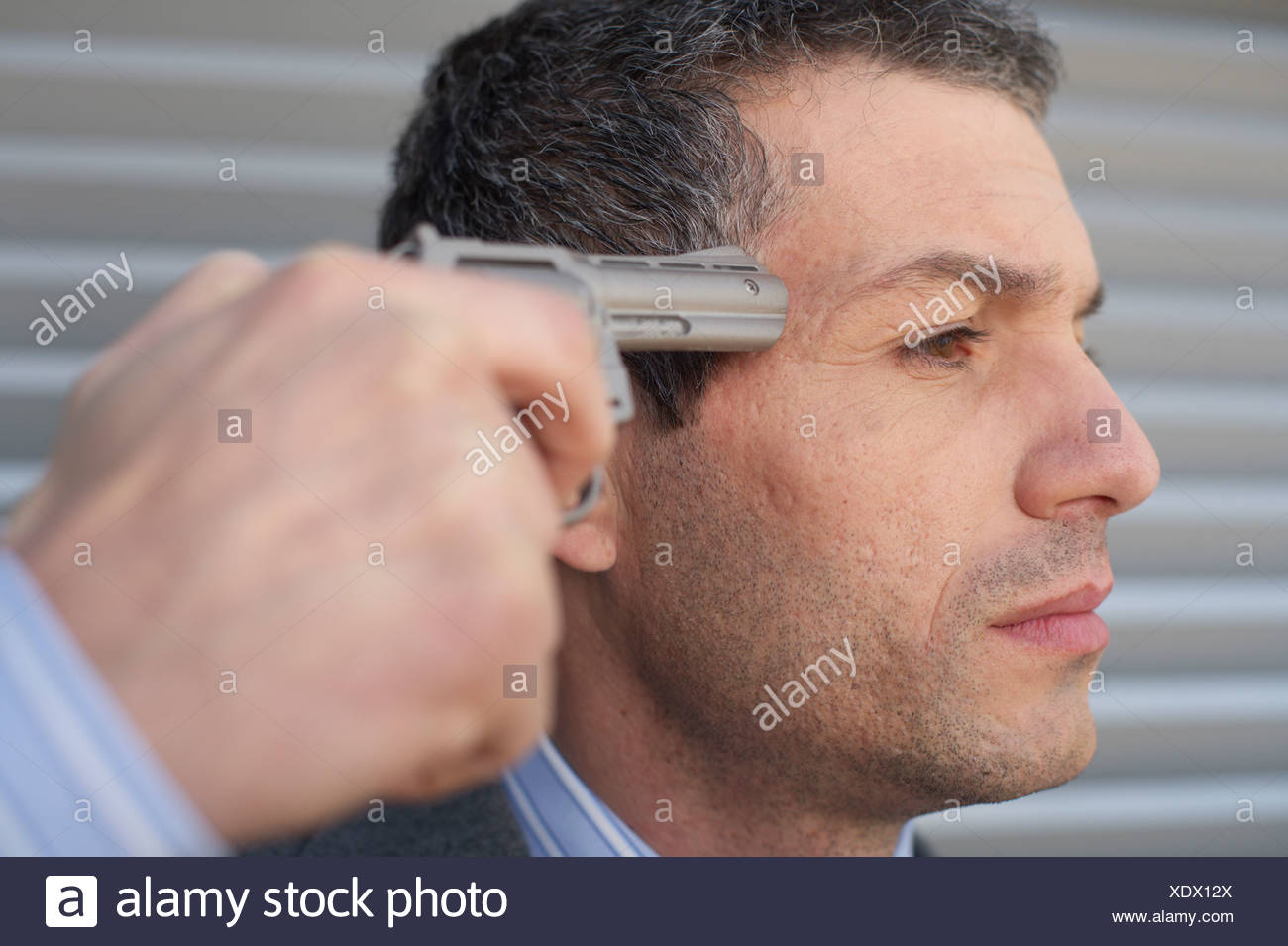 Hand Holding Gun Profile High Resolution Stock Photography and Images ...