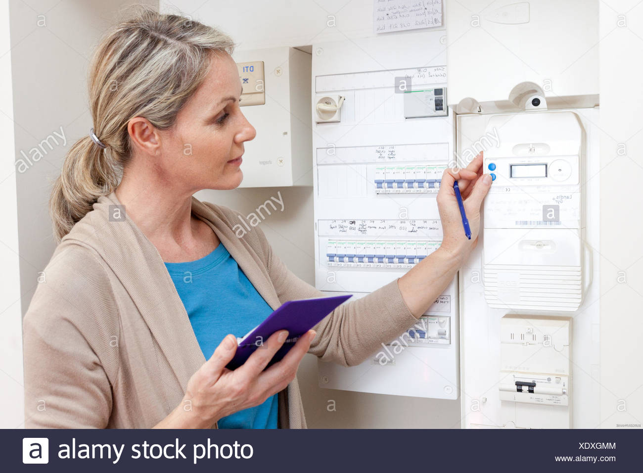 Woman Reading Energy Meter High Resolution Stock Photography and Images ...