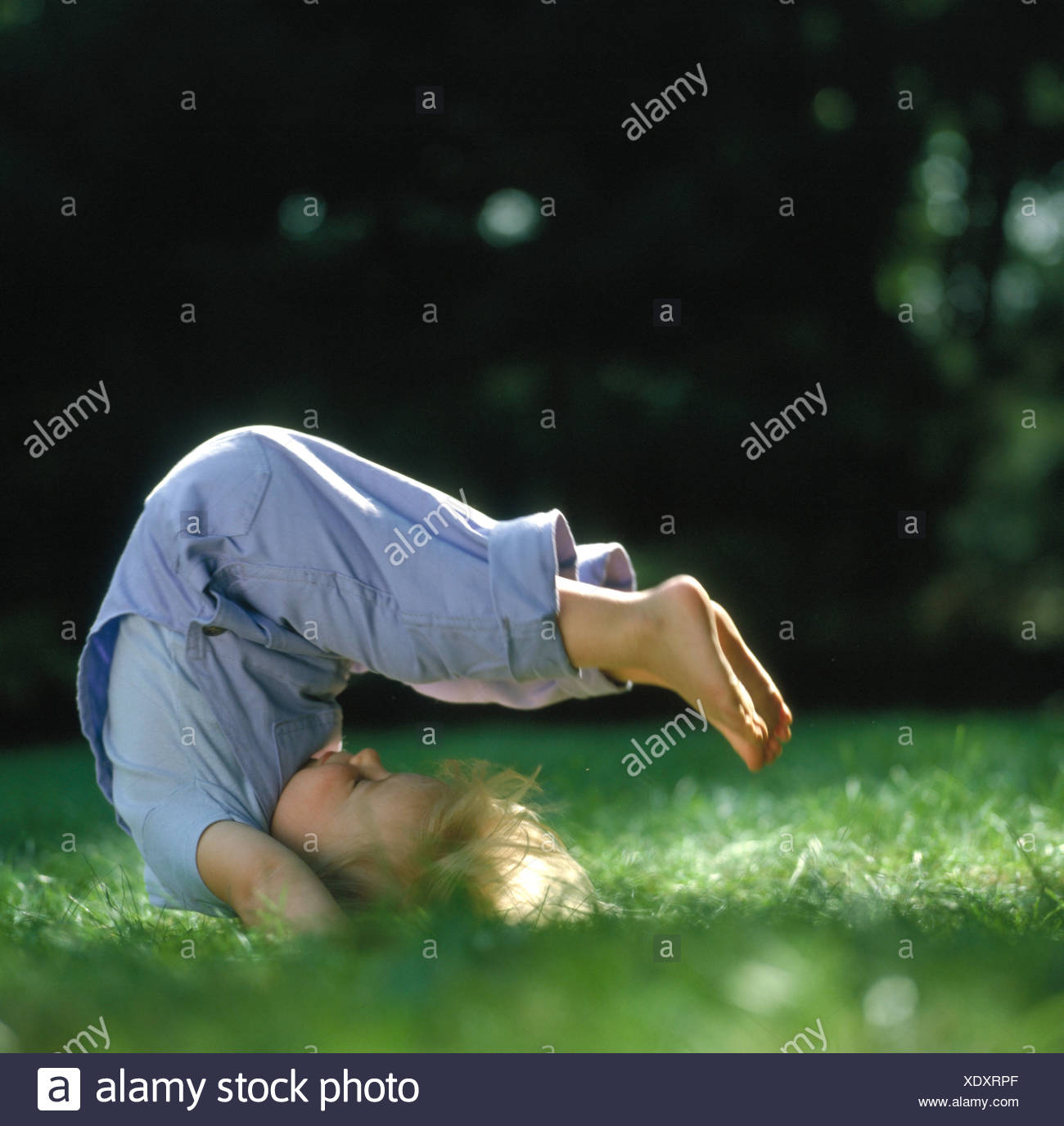 Kids Bending Over High Resolution Stock Photography and Images - Alamy