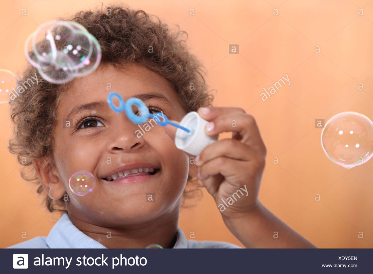 Child Popping Bubbles High Resolution Stock Photography and Images - Alamy